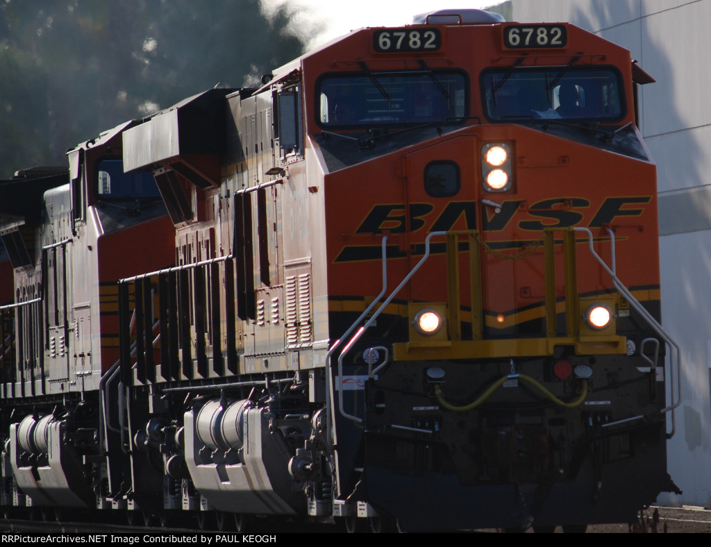 The Engineer and Conductor in BNSF 6782 as they roll east with a Z Train for BNSF Barstow yard ...